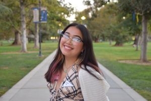 Sharon Tan - Iota Phi Wiki